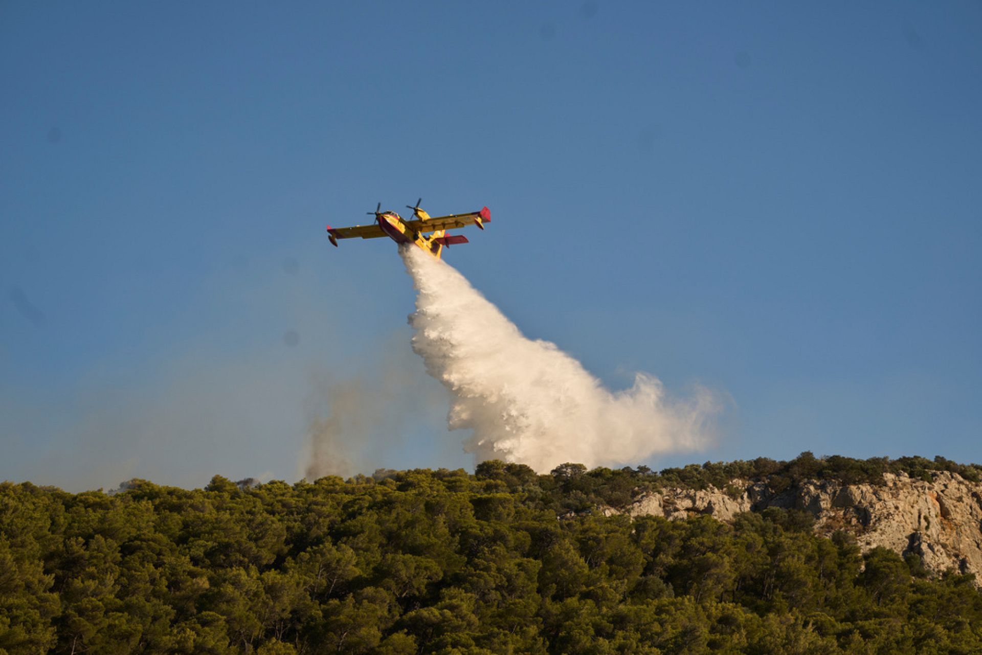 Firefighters battle wildfires in Greece and Turkey, prompting ...