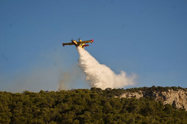 Firefighters battle wildfires in Greece and Turkey, prompting ...
