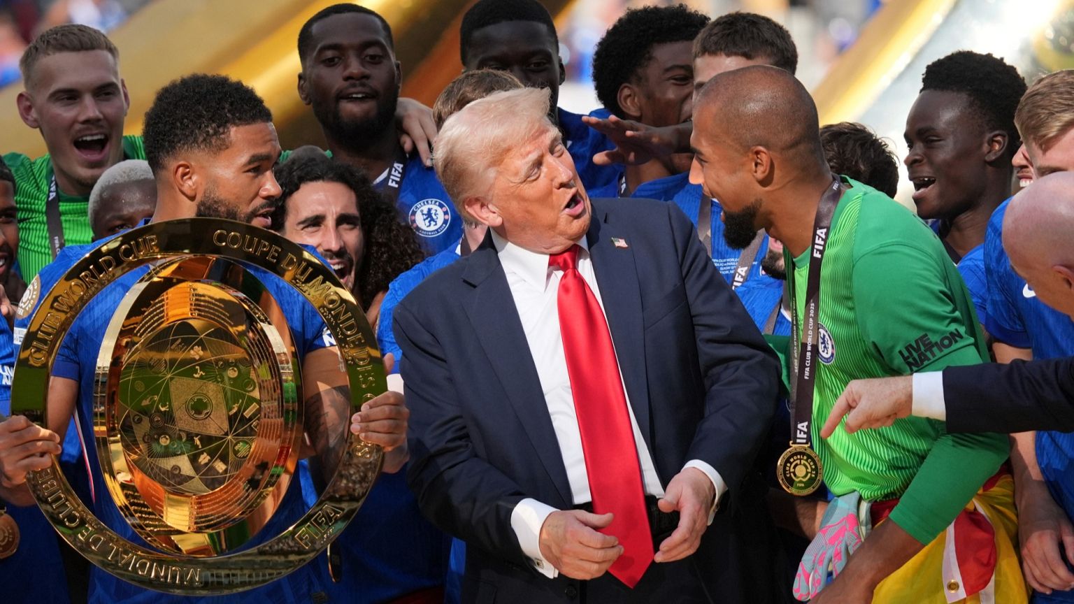 Trump puzzles Chelsea players as he crashes Club World Cup trophy party | Euronews