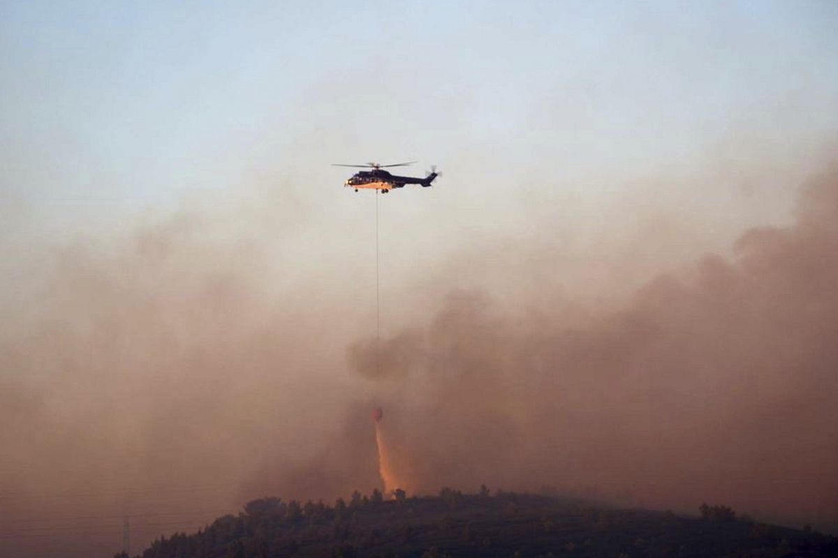 Firefighters in Cyprus battle huge wildfires that forced evacuation of ...