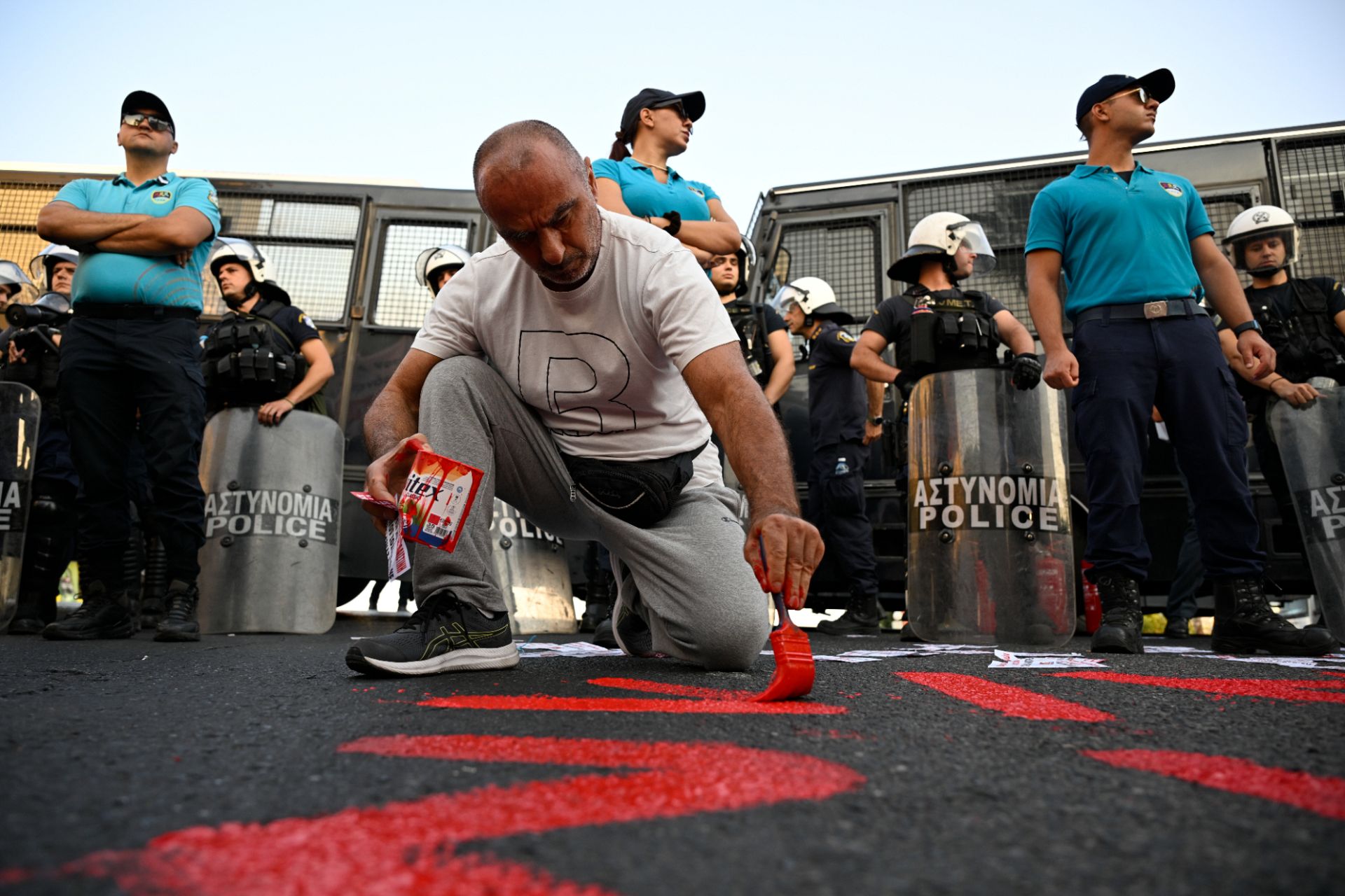 Riot police block pro-Palestine protesters from approaching Israeli ...
