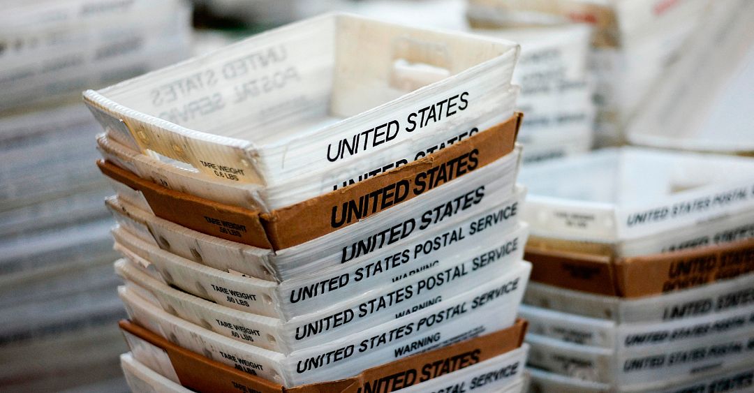 International postal services pause parcel post to US over tariff ...