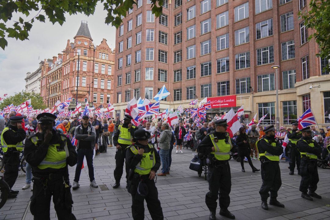 Police assaulted during massive London march organised by far-right ...