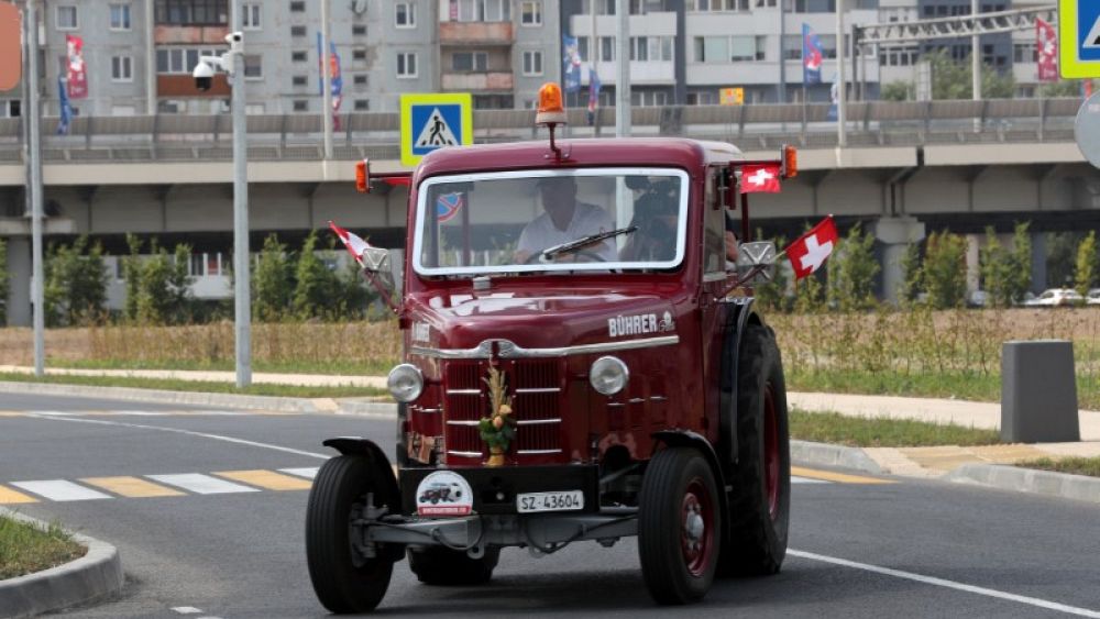 Swiss tractor ploughs through traffic to reach World Cup | Euronews