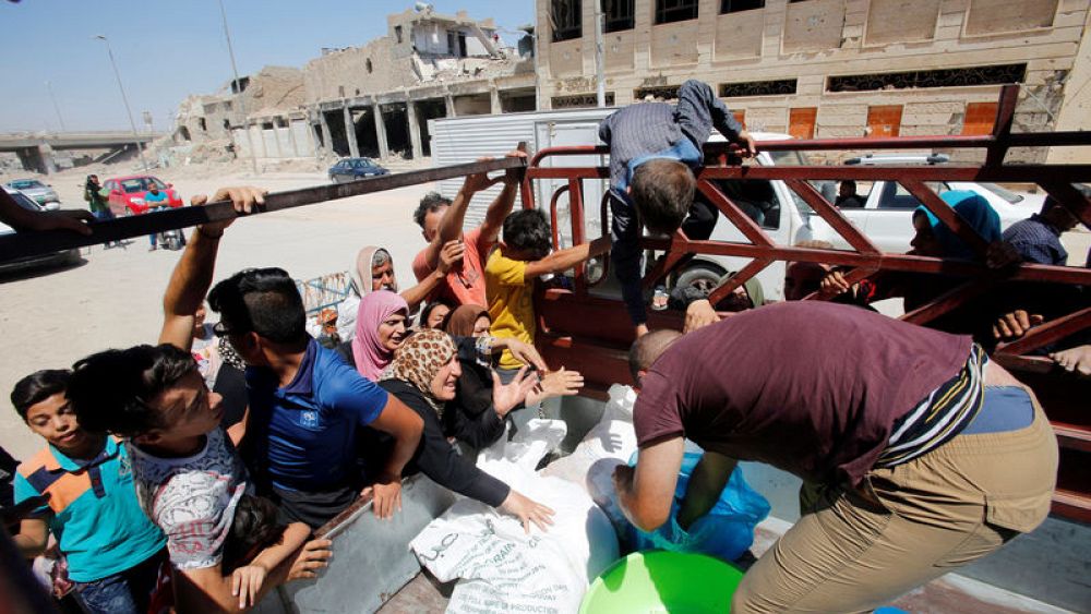 Survivors of last major Islamic State battle in Iraq beg for food ...