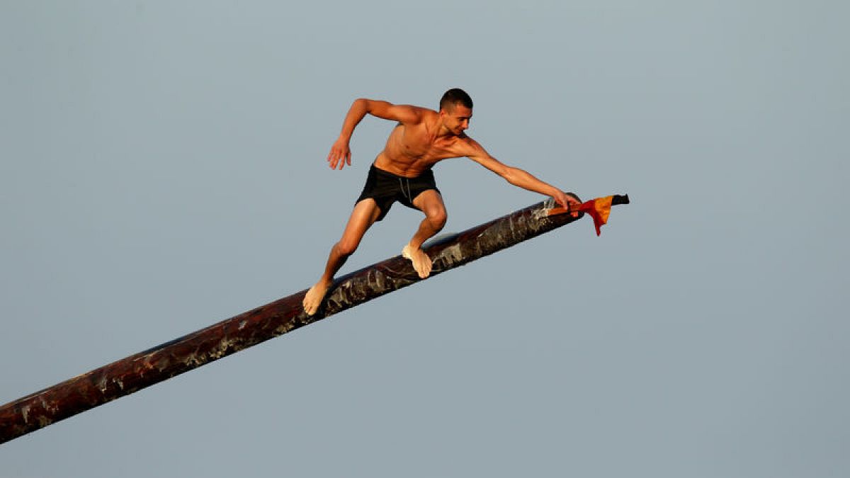 Ready, steady, splash! Malta celebrates historic greasy pole tournament ...