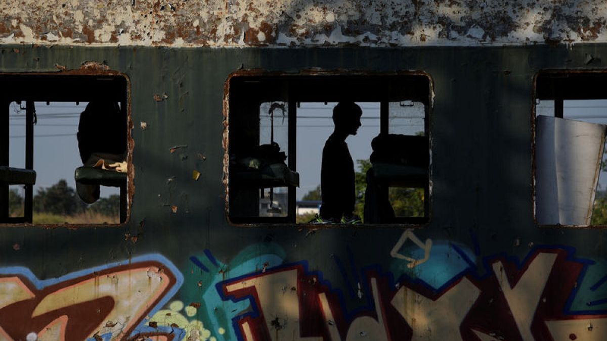 Migrant stowaways ride Greek freight trains seeking escape to north ...