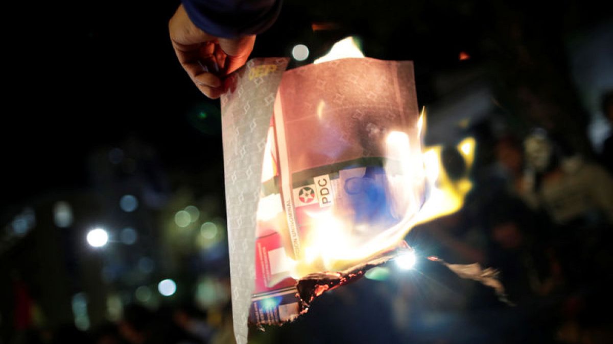 Ballot boxes burn in Bolivia as contested vote count ignites protests ...