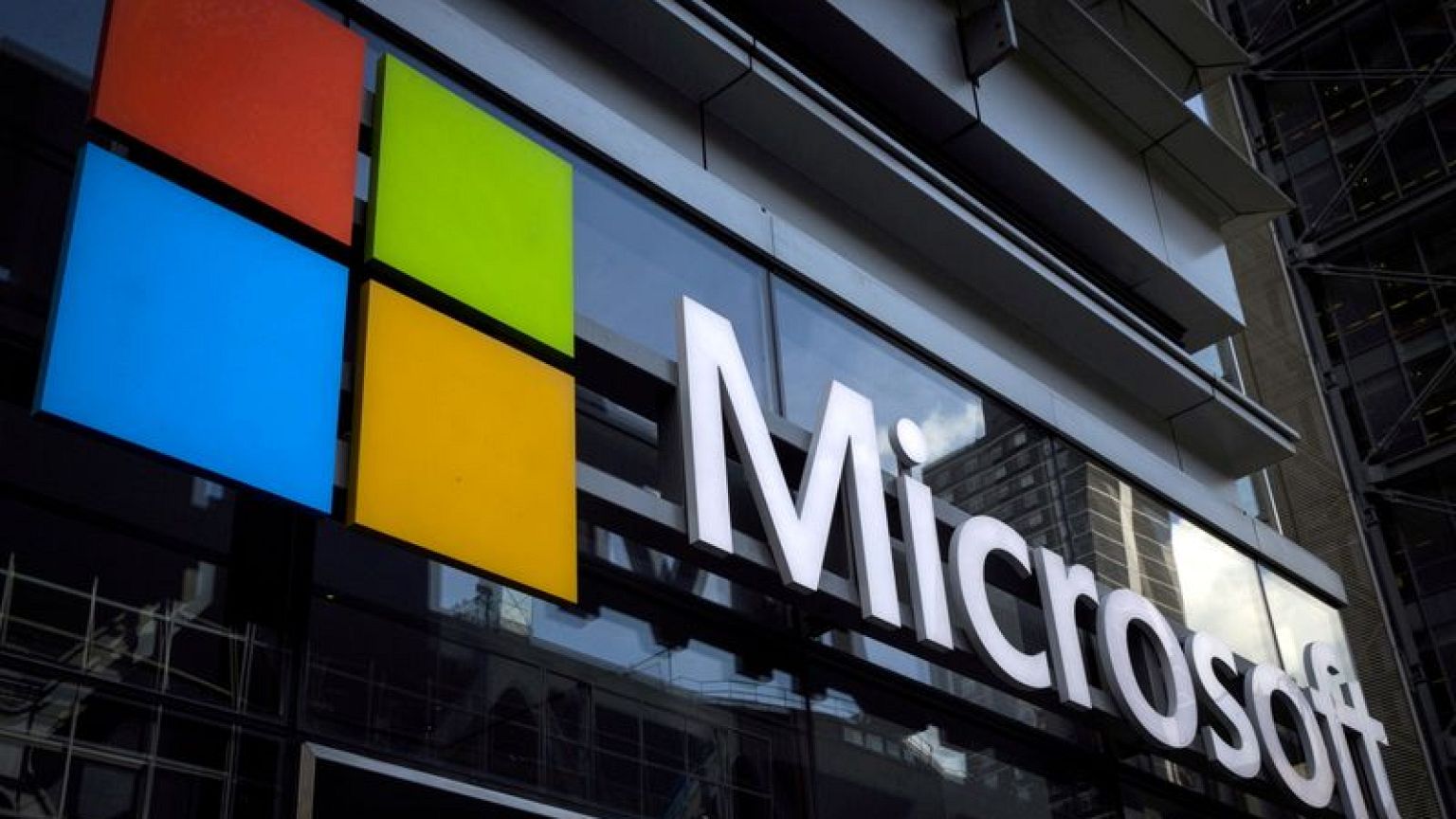 Microsoft sales grow on cloud strength, shares dip on heightened ...