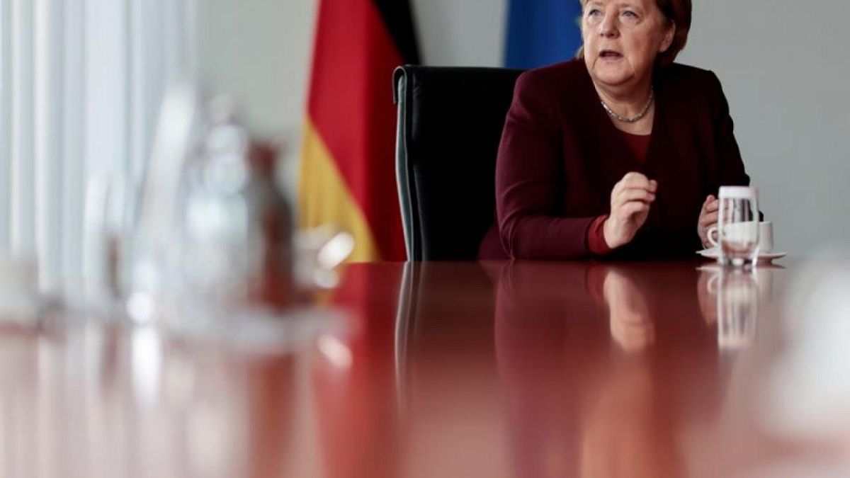 Exclusive-Merkel defends nuclear power exit despite climate challenges ...