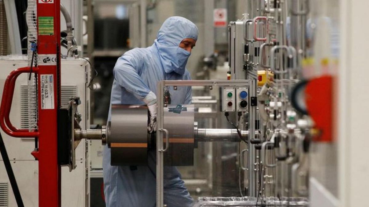 UK factory activity growth revised up in December - PMI | Euronews