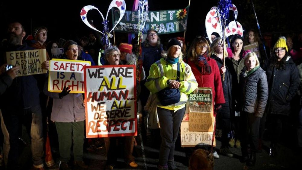 Migrants return to UK processing centre after being left in London ...