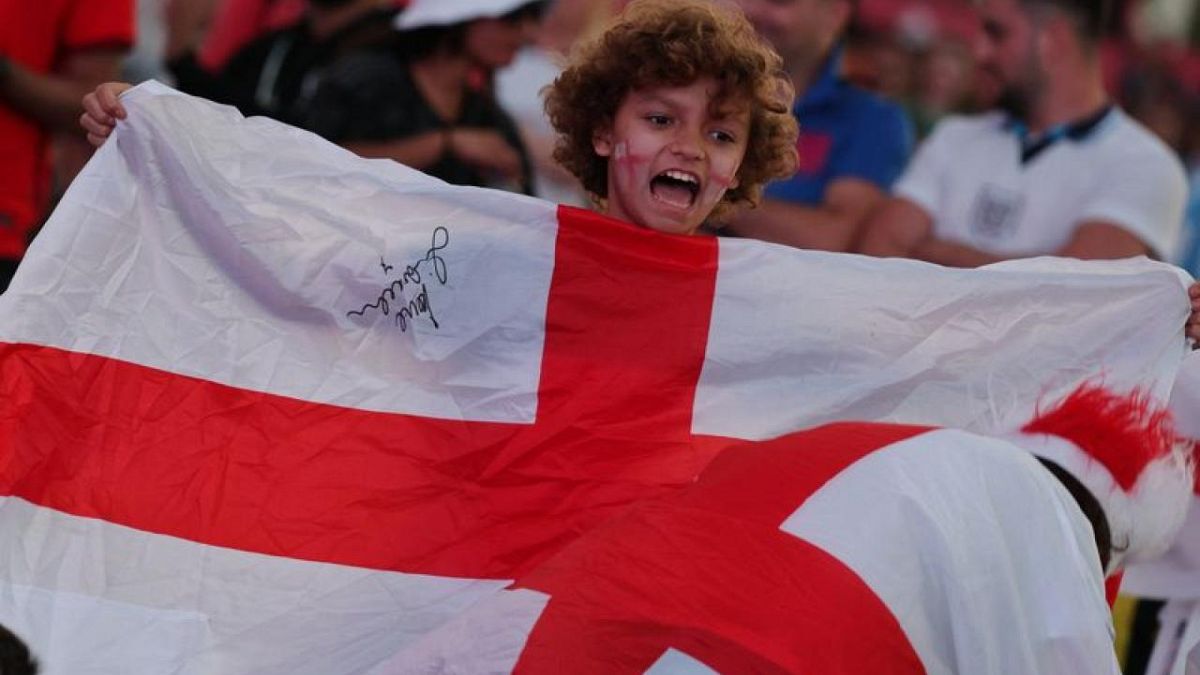 Soccer-England fans enjoy their day in the sun at World Cup opener ...