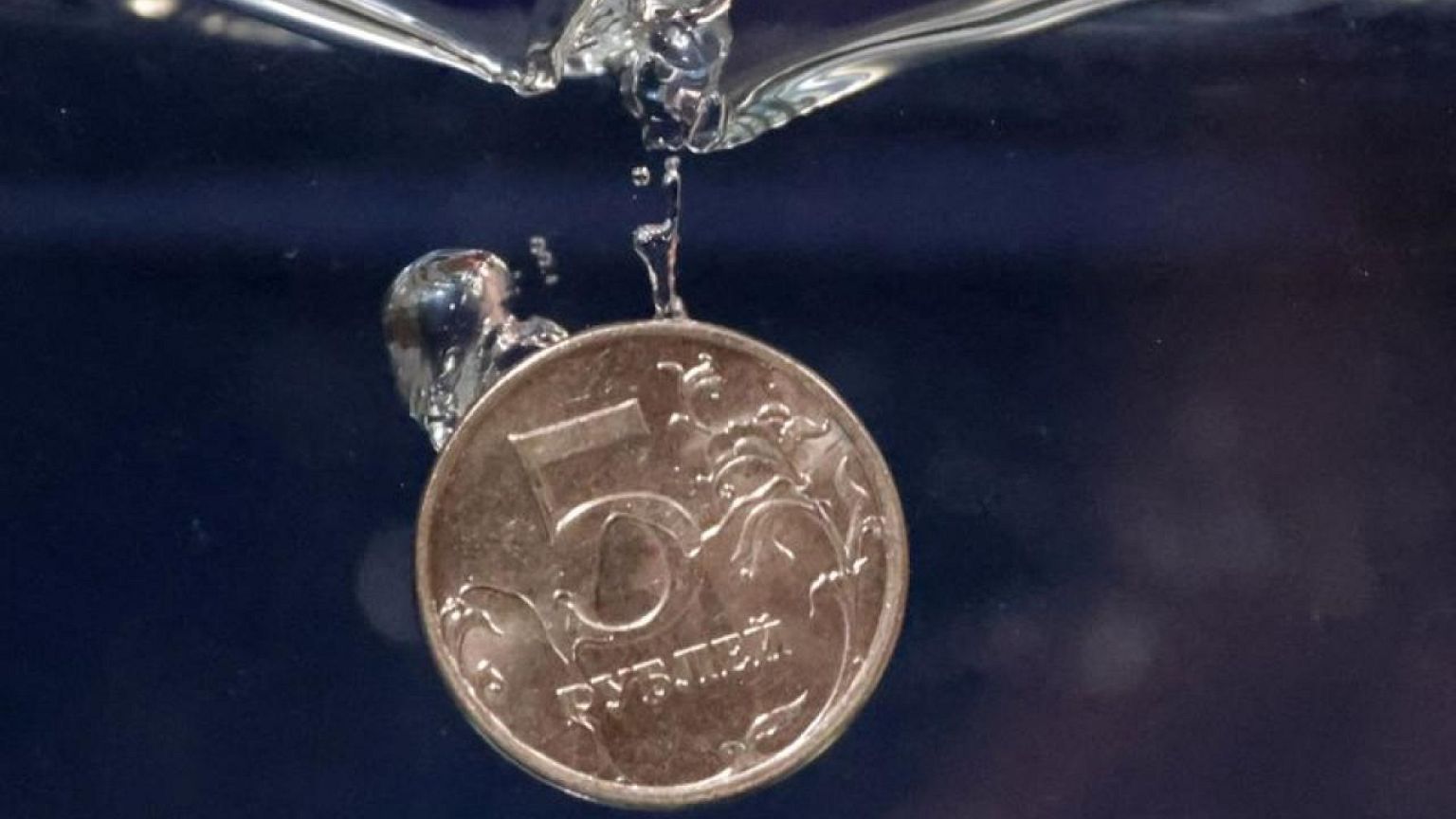 Rouble recovers after hitting 8-month low vs dollar on sanctions fears ...