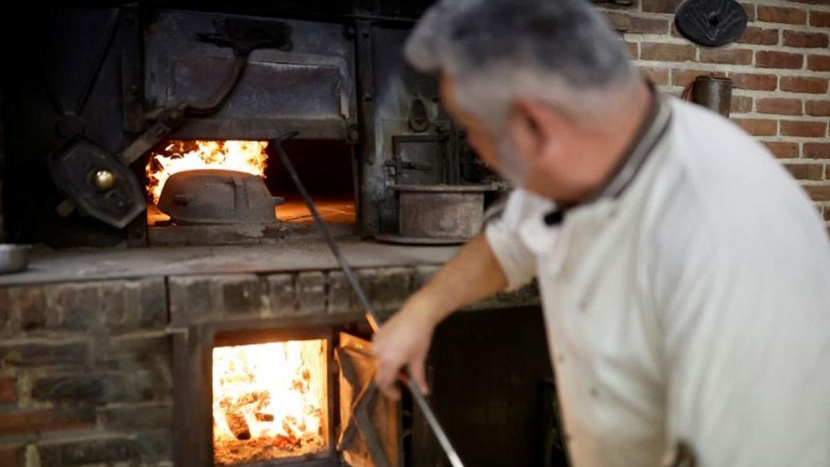 Back to basics: wood-fired oven shields French baker from soaring ...